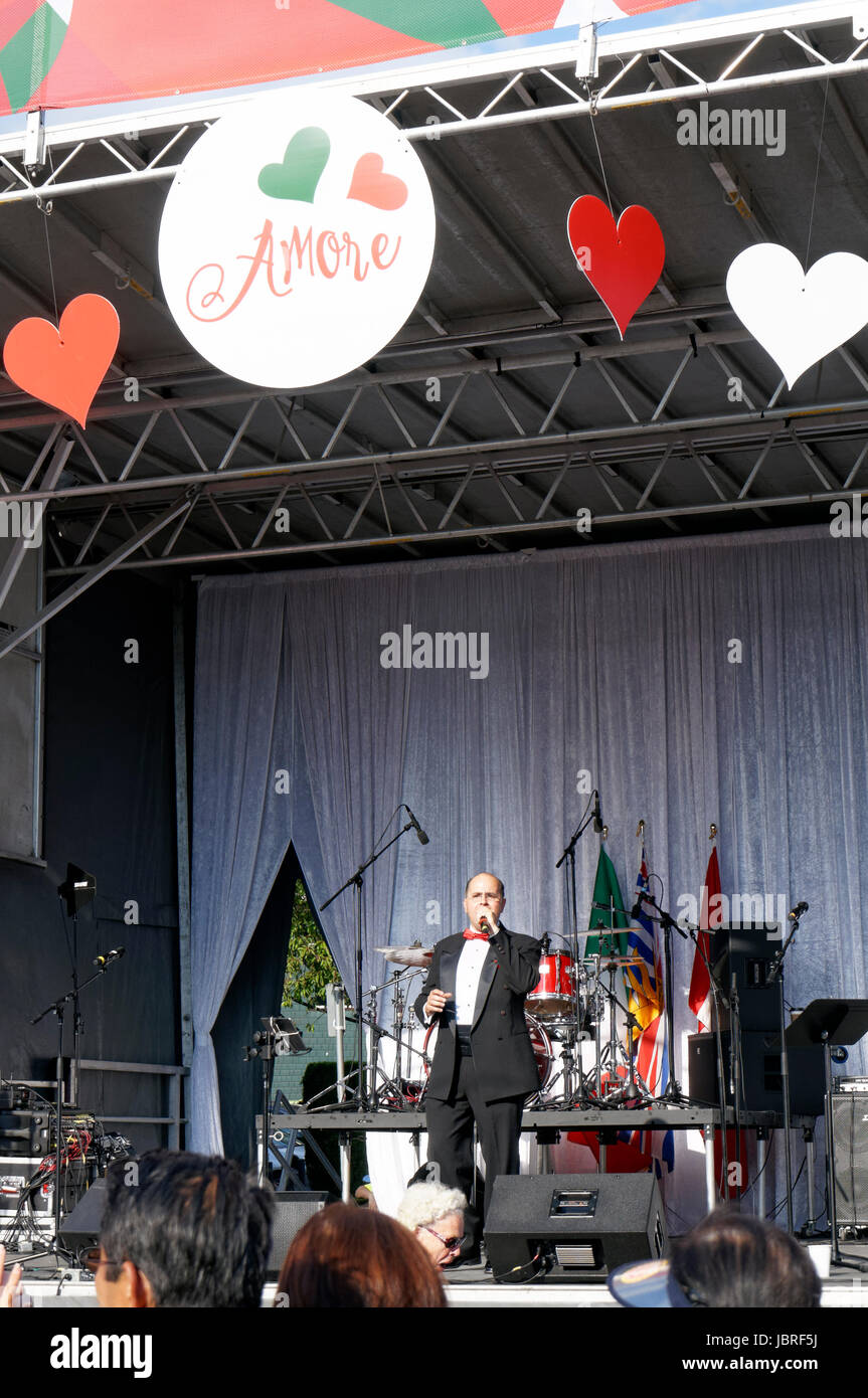 An opera singer performs on an outdoor stage at the annual Italian Day ...