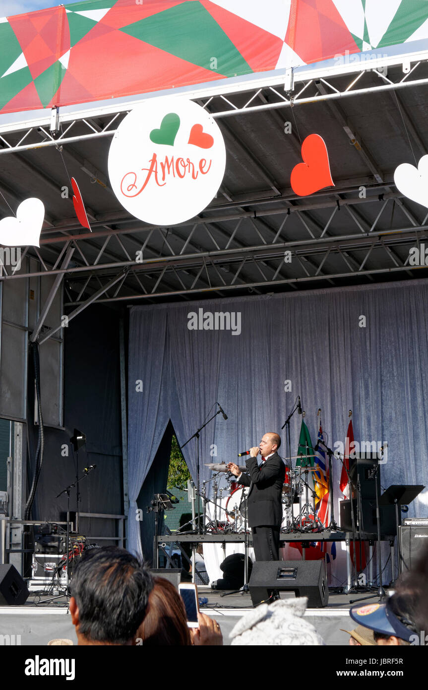 An opera singer performs on an outdoor stage at the annual Italian Day ...