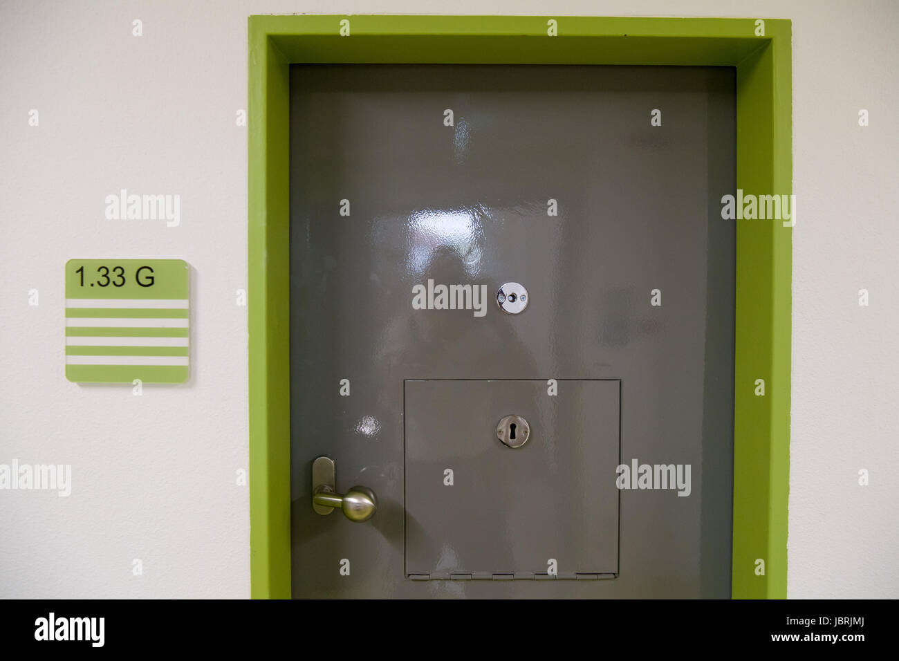 A green cell door can be seen at the new Deportation Detention Centre ...