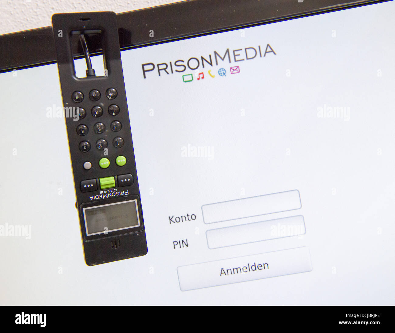 The words "PrisonMedia" can be seen on a computer screen at the new ...