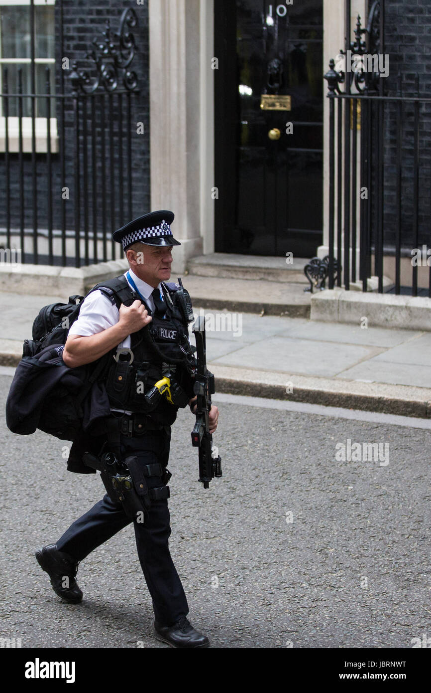 Passes an armed police officer hi-res stock photography and images - Alamy