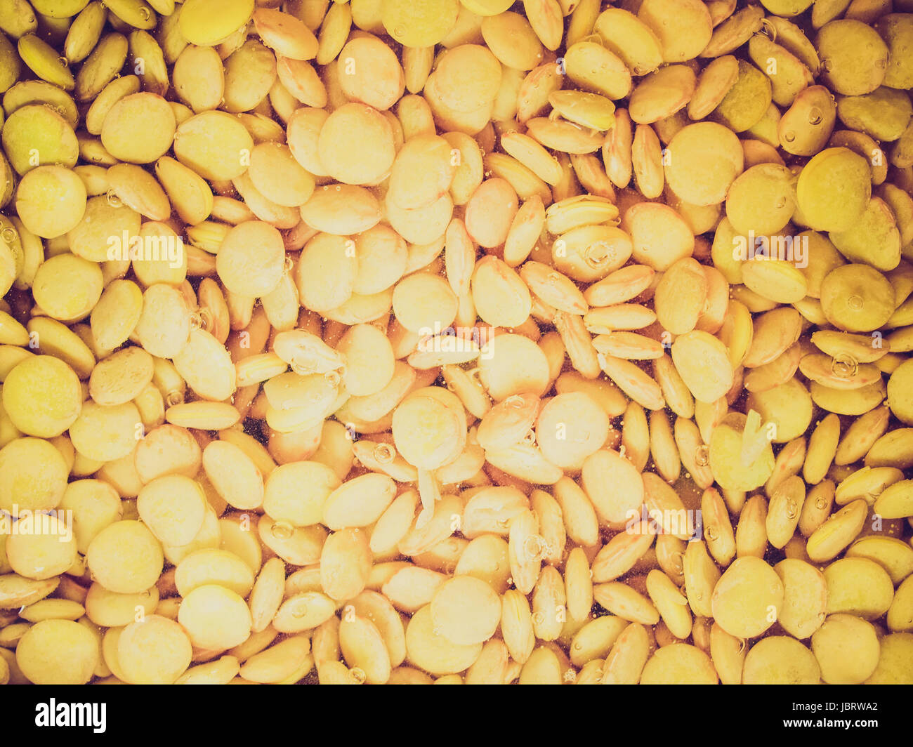 Vintage retro looking Picture of Lentils soup salad food background ...