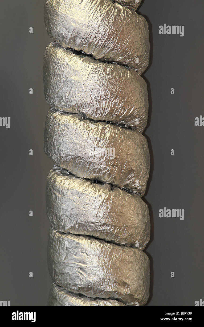 Aluminum insulation for building ventilation Stock Photo - Alamy