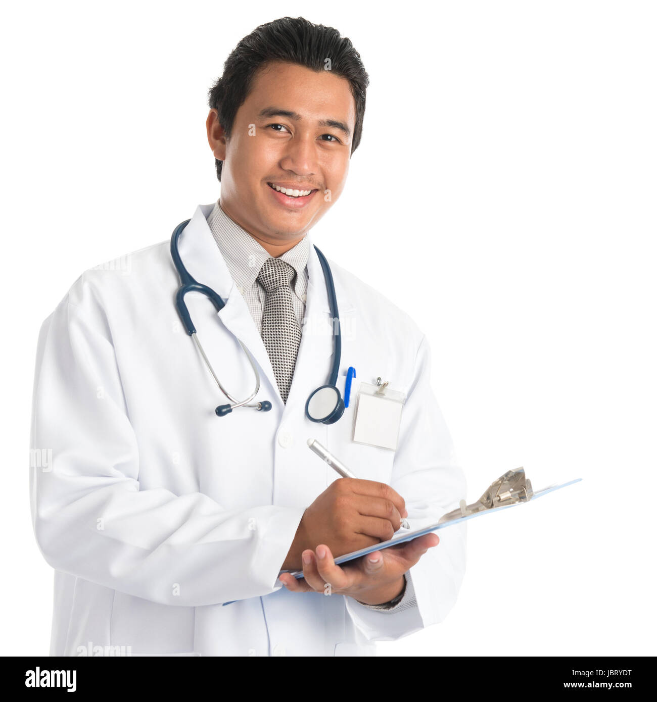 Portrait of southeast Asian male doctor writing medical report ...