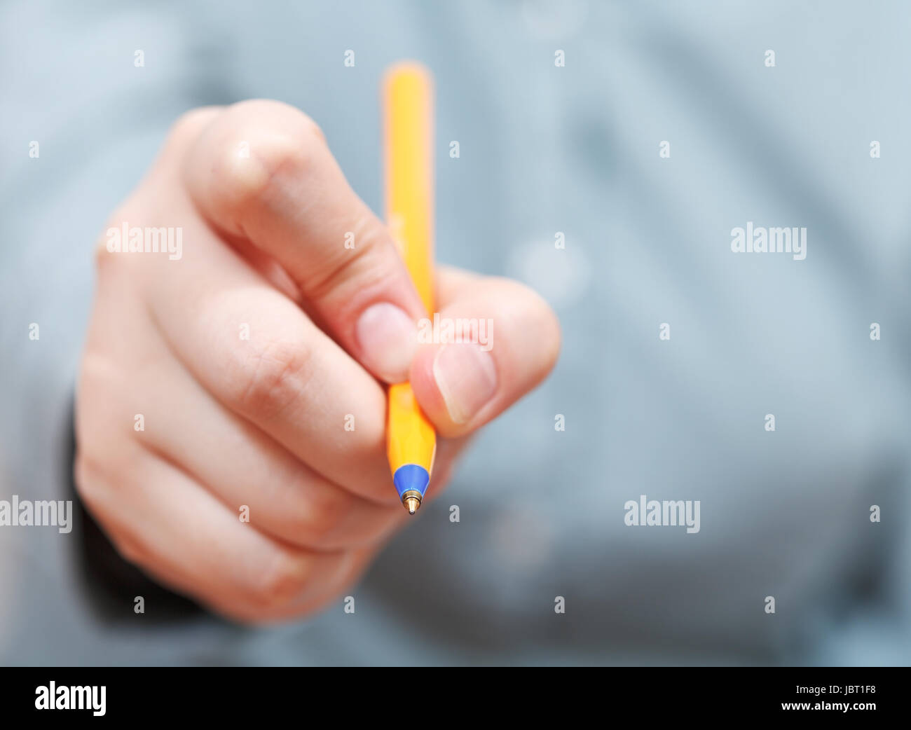 tip of pen close up in female hand Stock Photo - Alamy