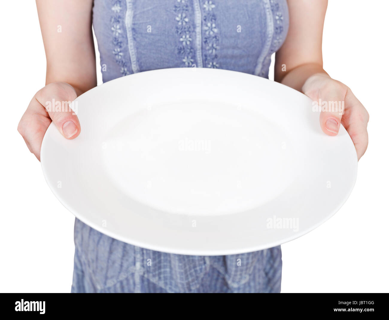 woman holds empty white plate isolated on white background Stock Photo ...