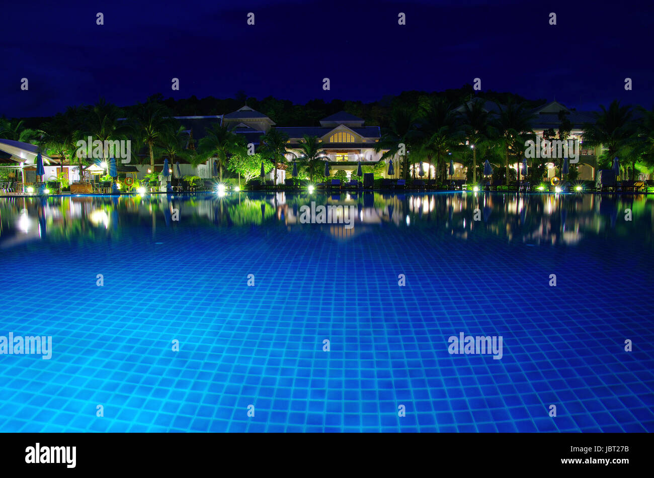 Swimming pool in night illumination Stock Photo - Alamy
