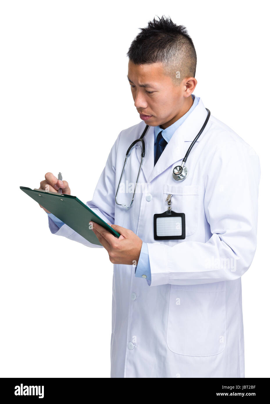Male doctor record somthing on clipboard Stock Photo - Alamy