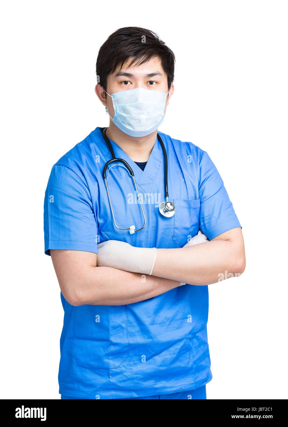 Doctor with face mask in surgical uniform Stock Photo - Alamy