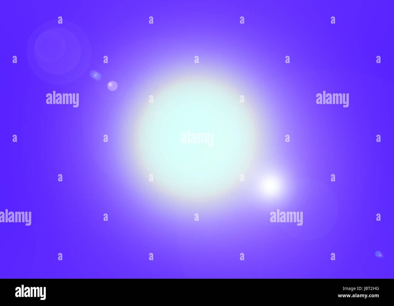 Blazing sun in a blue sky with lens flare Stock Photo - Alamy