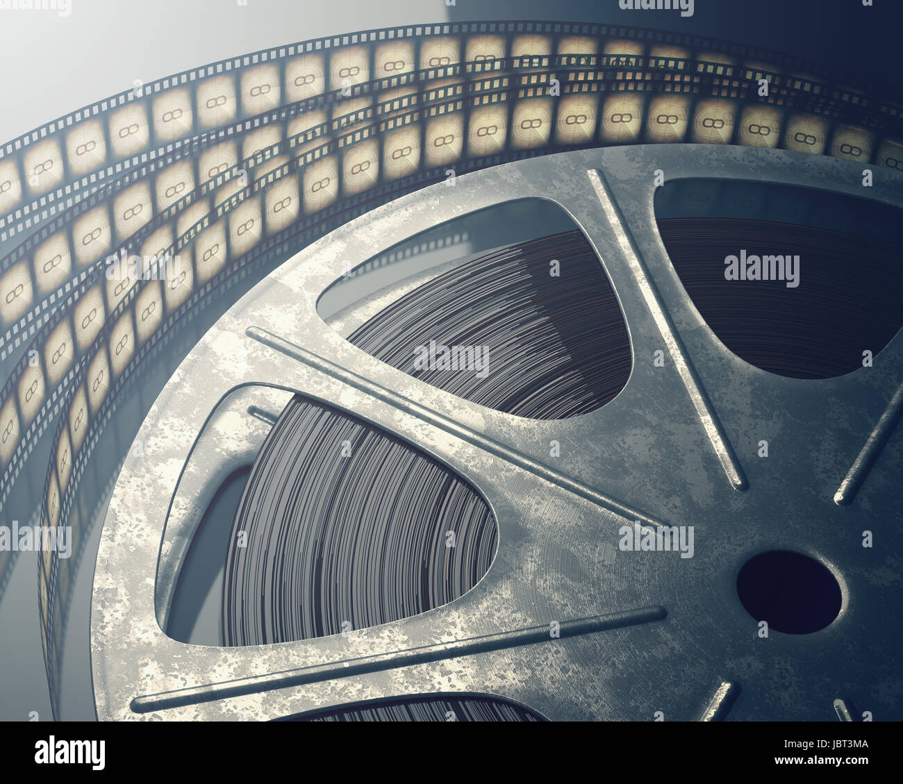 Old film roll on a reflective table Stock Photo - Alamy