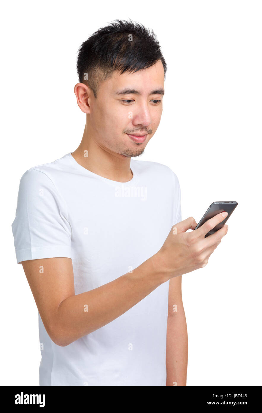 Young asian man texting message Stock Photo - Alamy