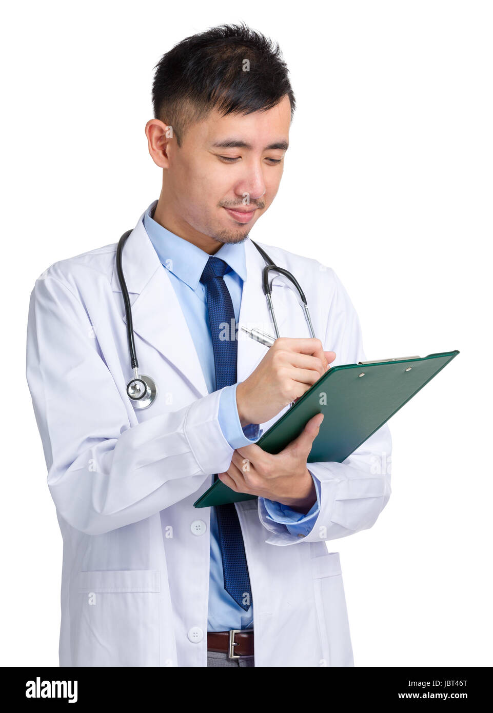 Male doctor writing on folder Stock Photo - Alamy