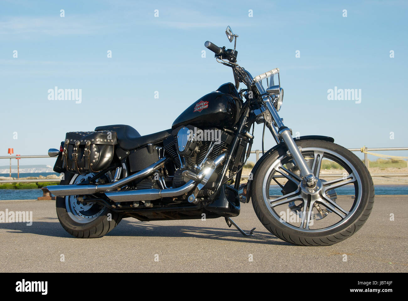 Harley Davidson motorcycle by a quay Stock Photo - Alamy