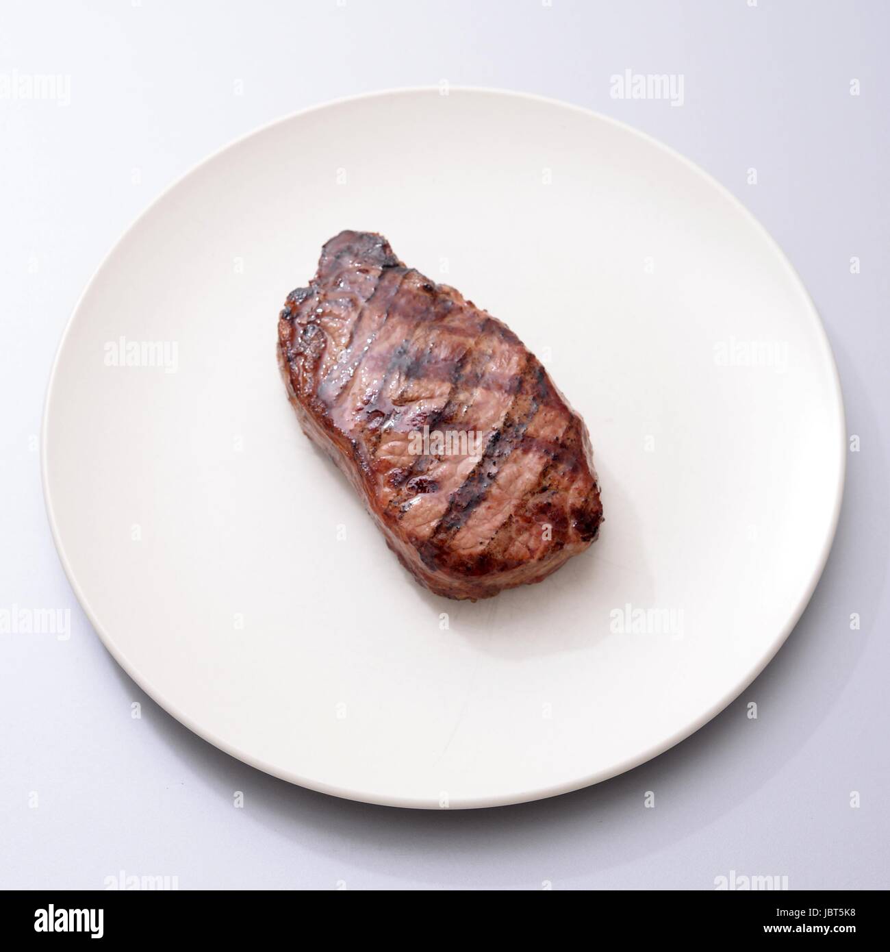 A close up shot of an Australian Porterhouse steak Stock Photo - Alamy