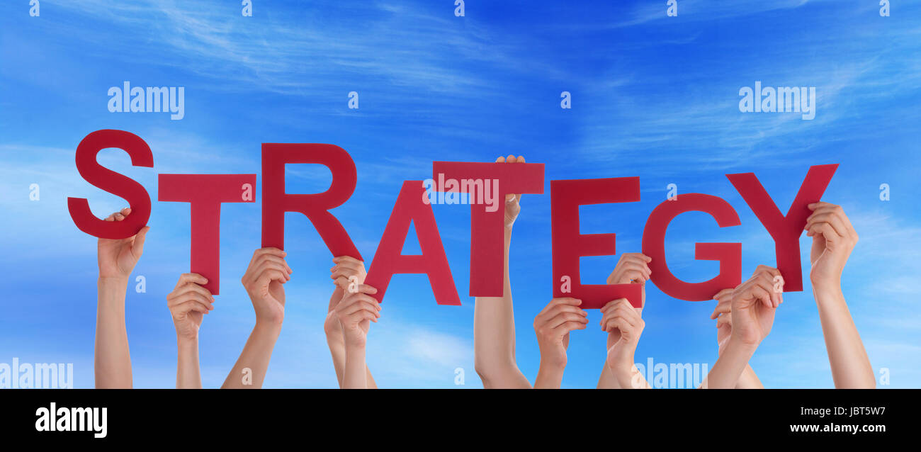 Many Hands Holding the Word Strategy in the Sky Stock Photo - Alamy