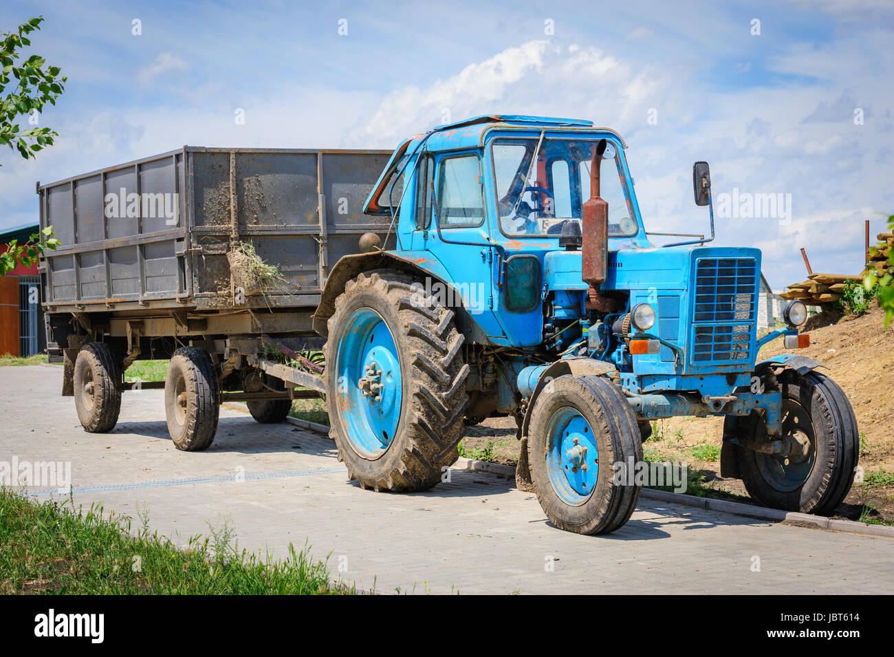 old agriculture tractor outdoors ready for work Stock Photo - Alamy