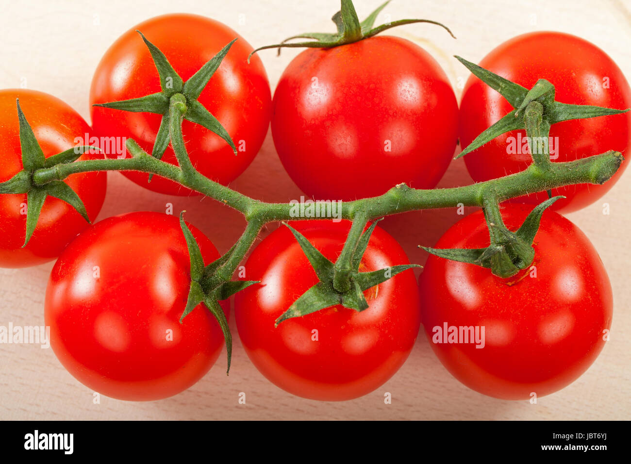 Close up picture of fresh cherry tomato on isolated background Stock ...