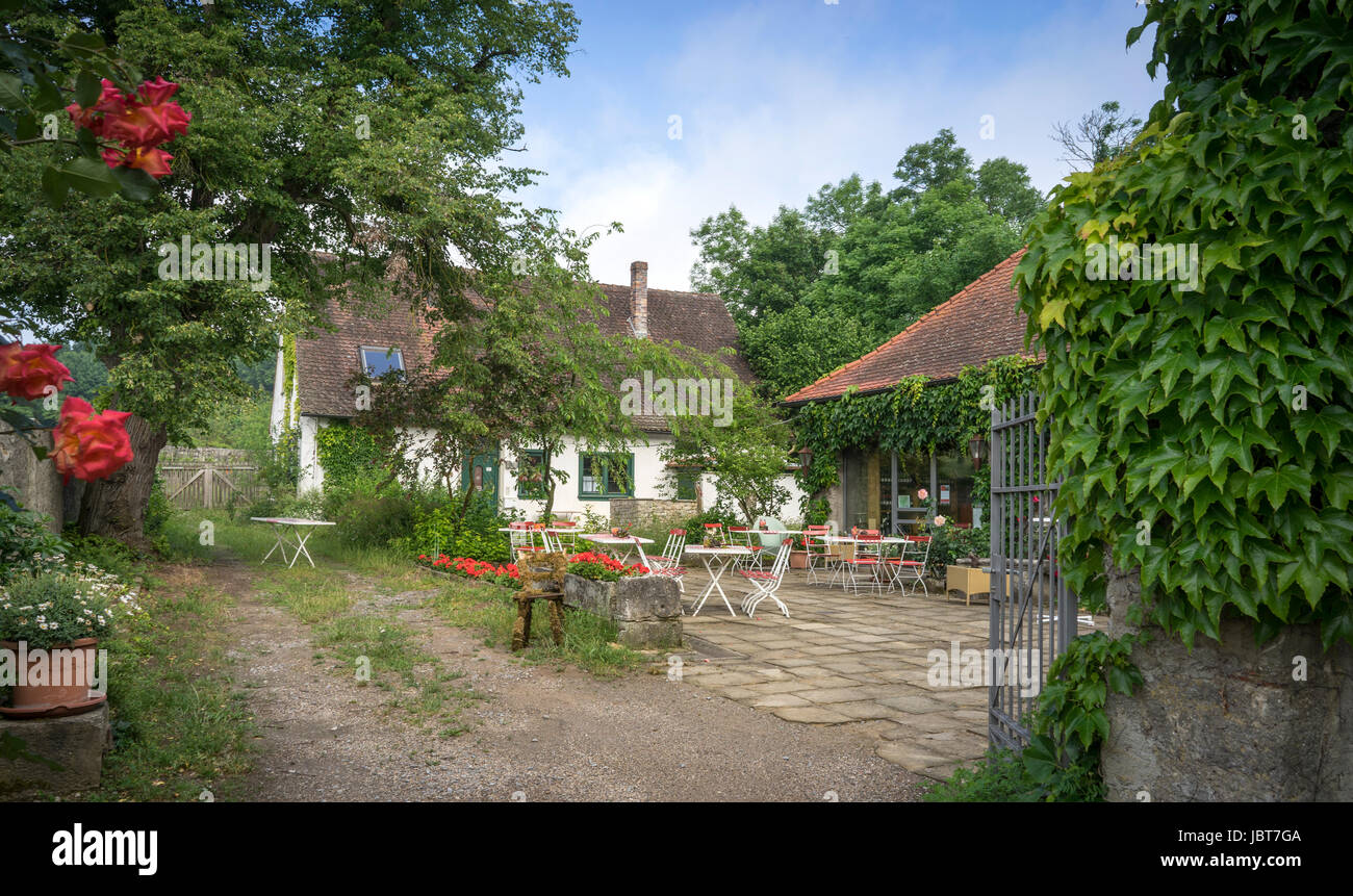 Bavarian backyard with sitting accommodation Stock Photo - Alamy