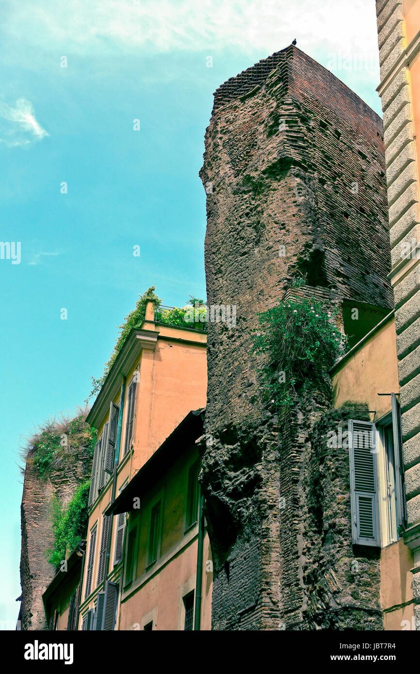 Houses built very close to the ruins of the Agrippa Thermal Baths in a ...