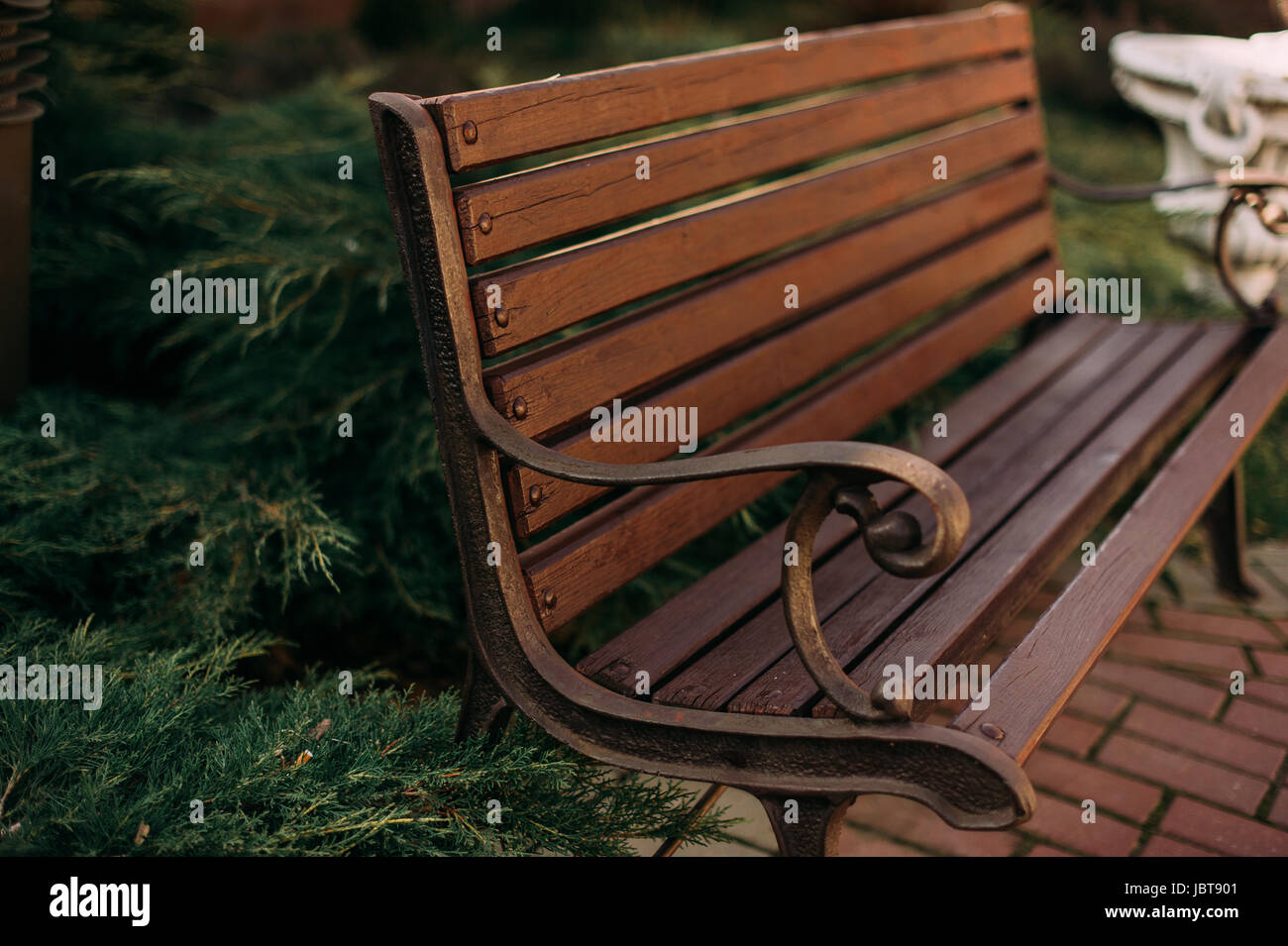 Stylish bench in summer park Stock Photo - Alamy