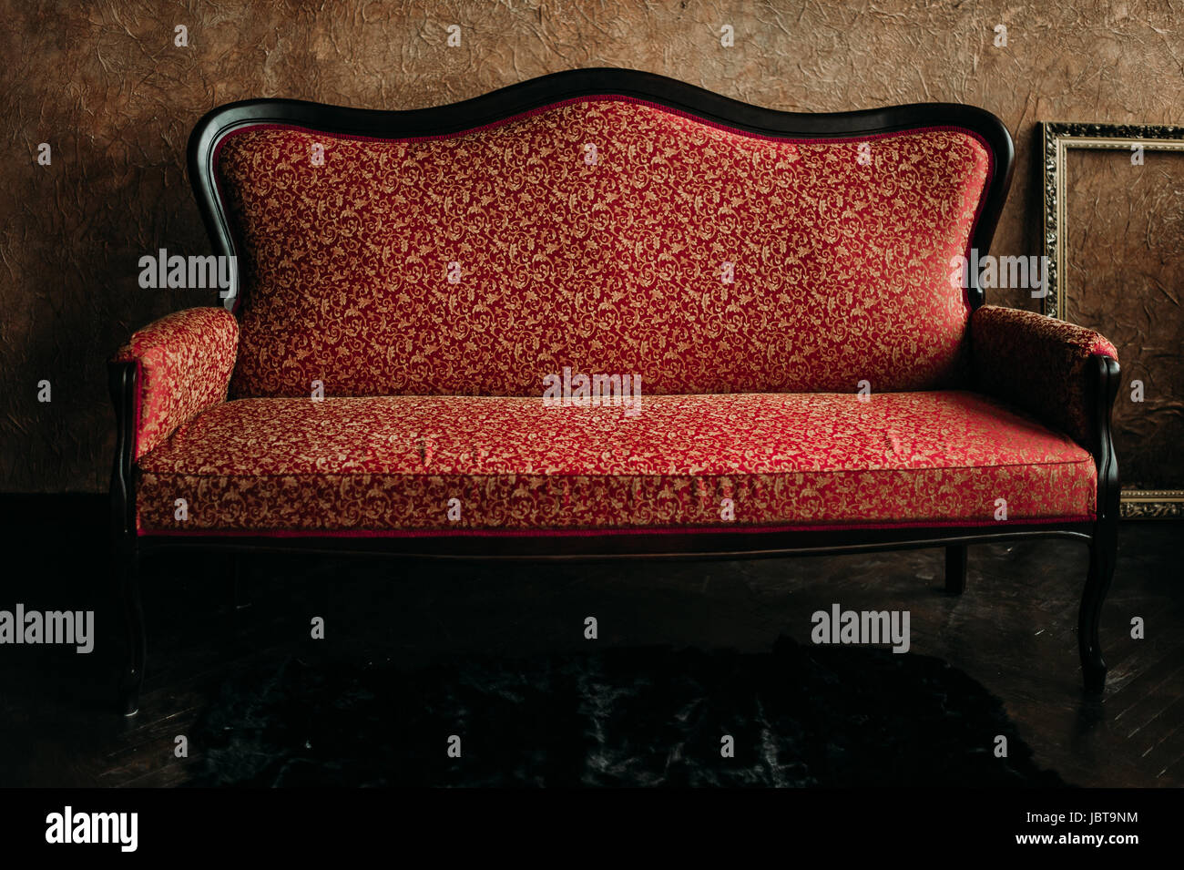 Red luxurious sofa Stock Photo - Alamy