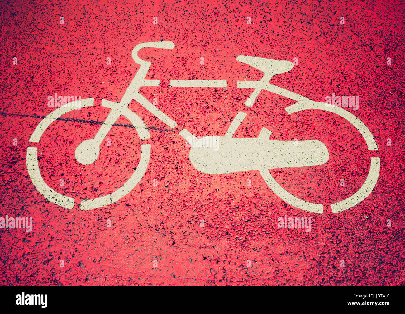 Vintage retro looking Stencil bike sign on a bicycle lane Stock Photo ...