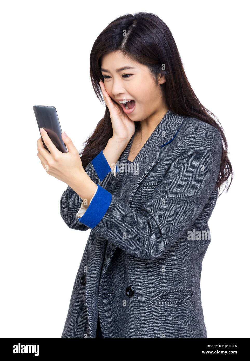 Woman surprise with text message Stock Photo - Alamy