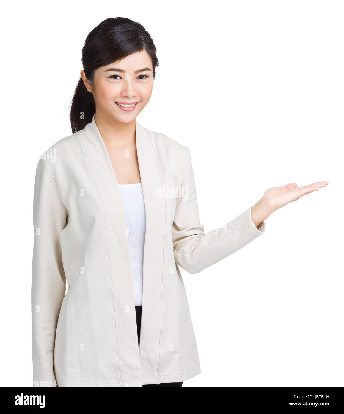 Woman with hand introducing something Stock Photo - Alamy