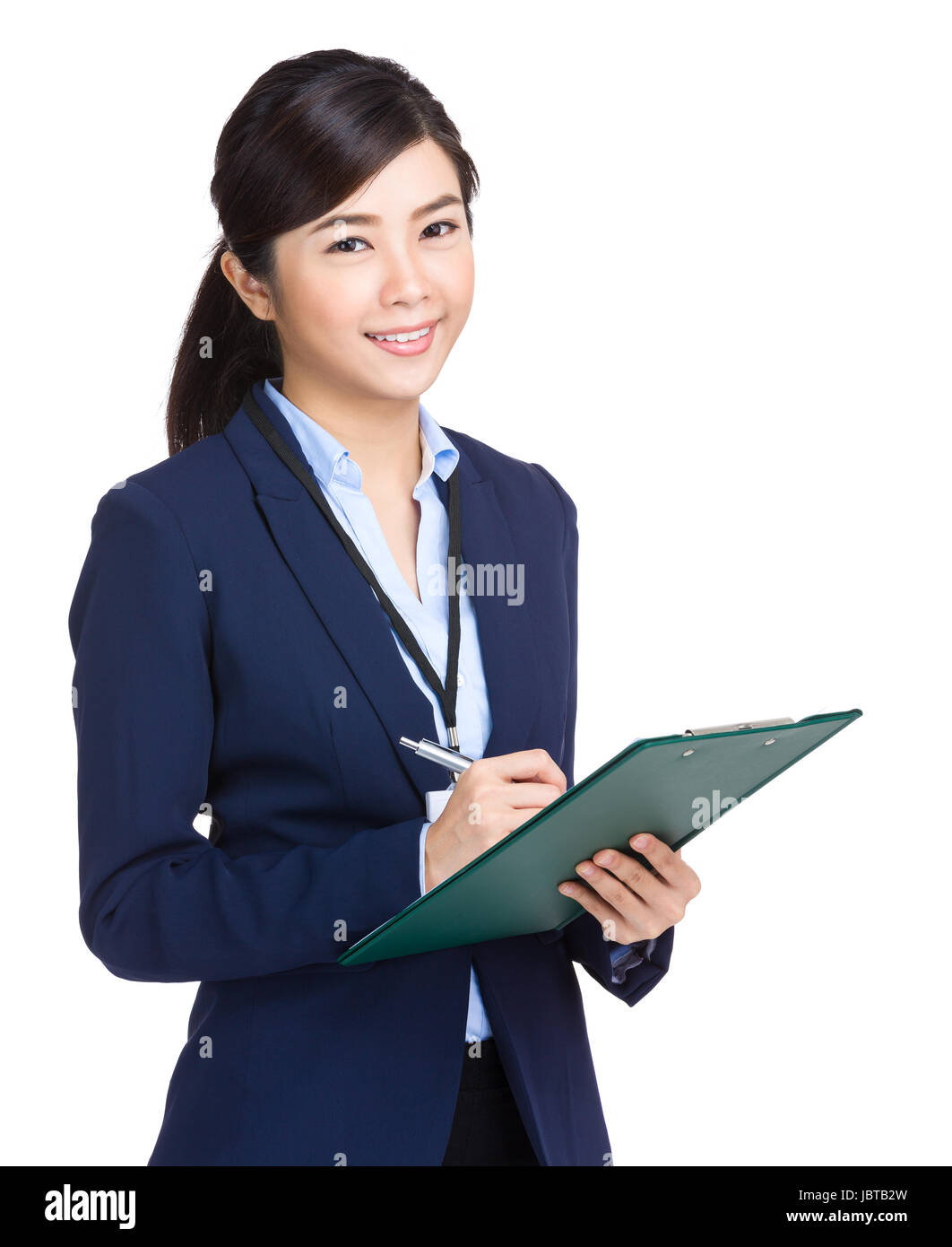 Business woman take note on clipboard Stock Photo - Alamy