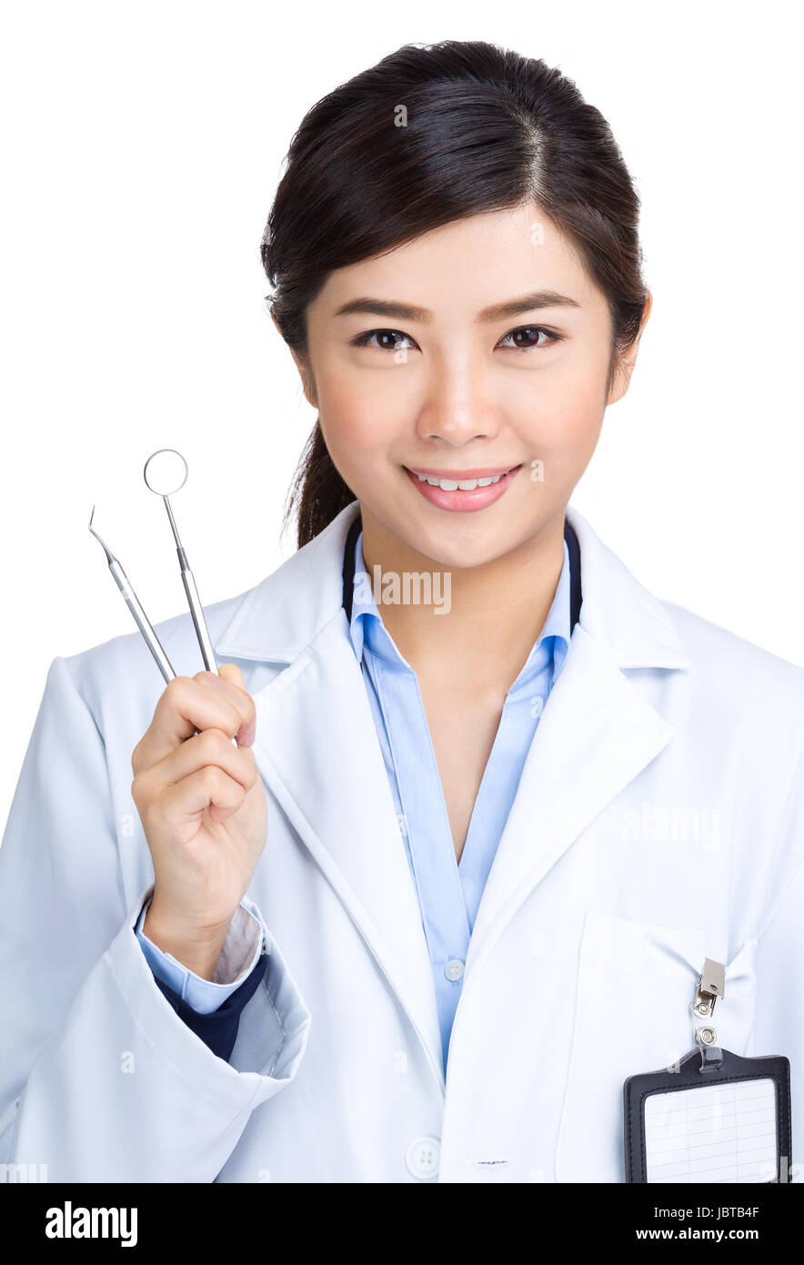 Female doctor hold with dental tool Stock Photo - Alamy