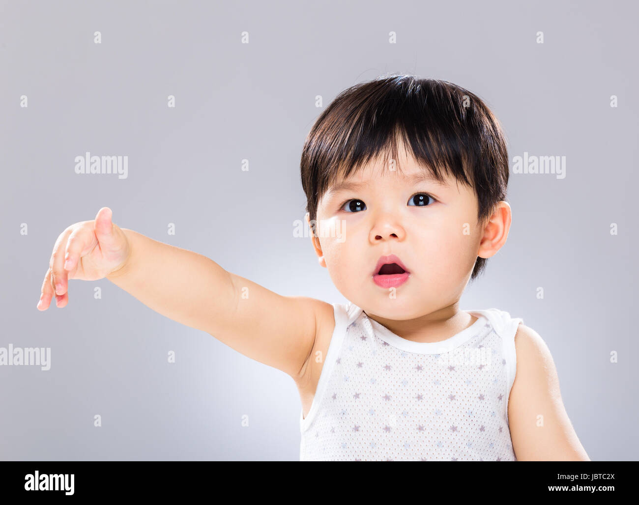 Baby boy hand up Stock Photo - Alamy