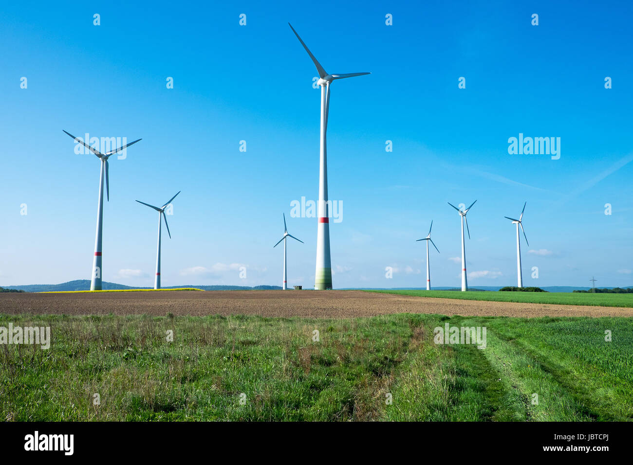 windmills in the fields Stock Photo - Alamy