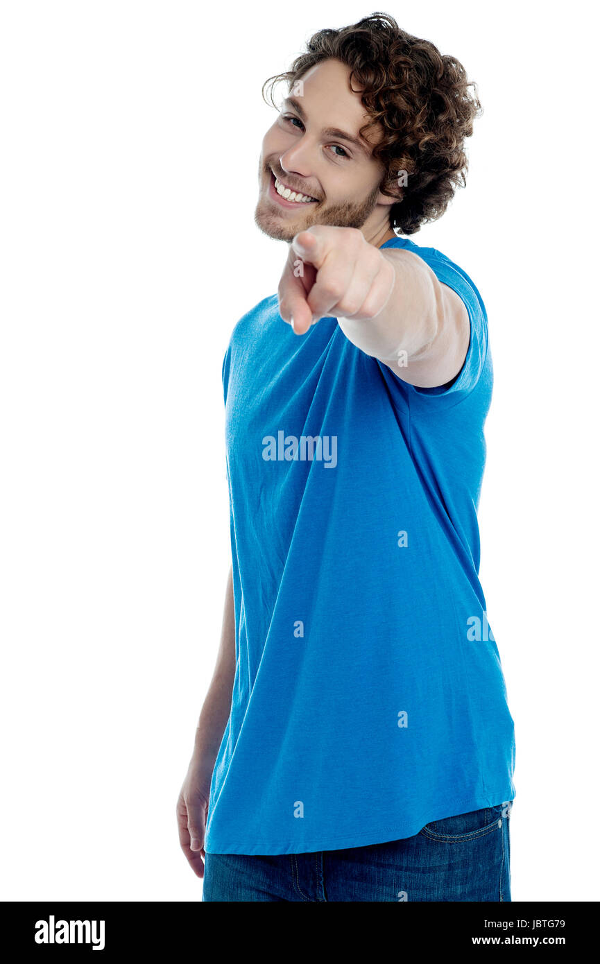 Happy young guy pointing at you, isolated on white Stock Photo - Alamy