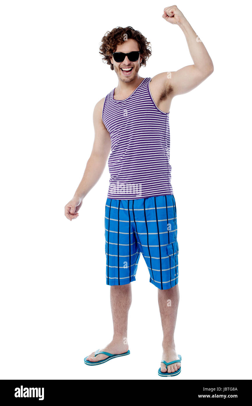 Young guy raising his hand in excitement Stock Photo - Alamy