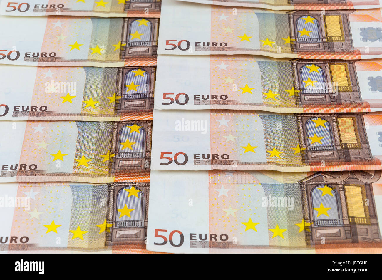 Background of 50 euro banknotes laying in a row Stock Photo - Alamy