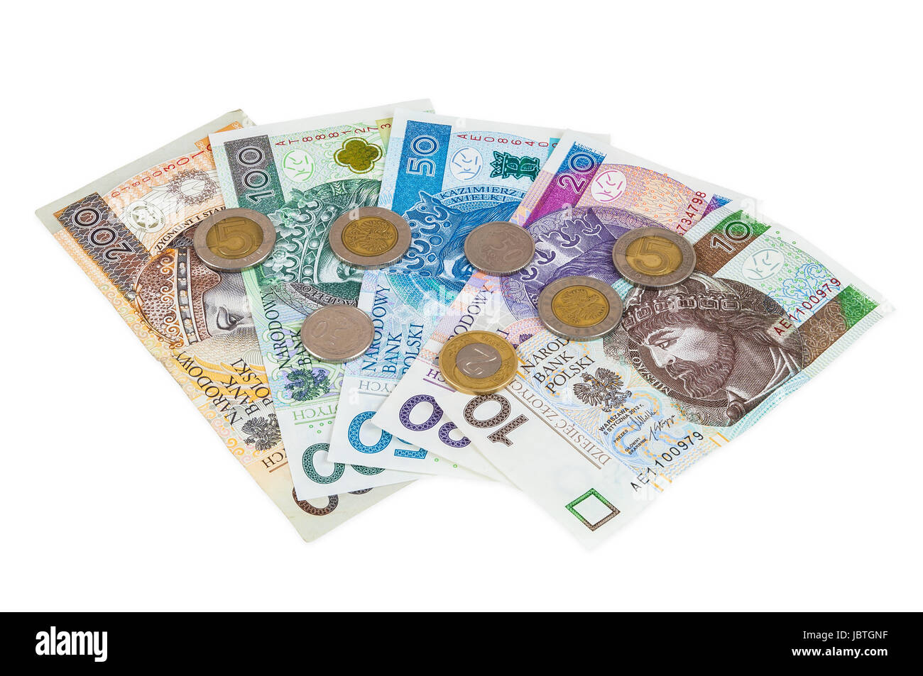 Set of new polish banknotes and coins isolated on white background with ...