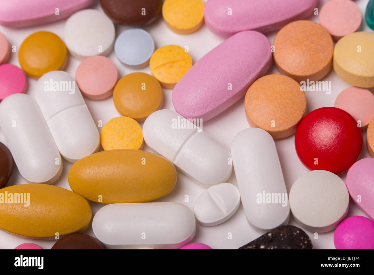 different Tablets pills capsule heap mix therapy drugs Stock Photo - Alamy