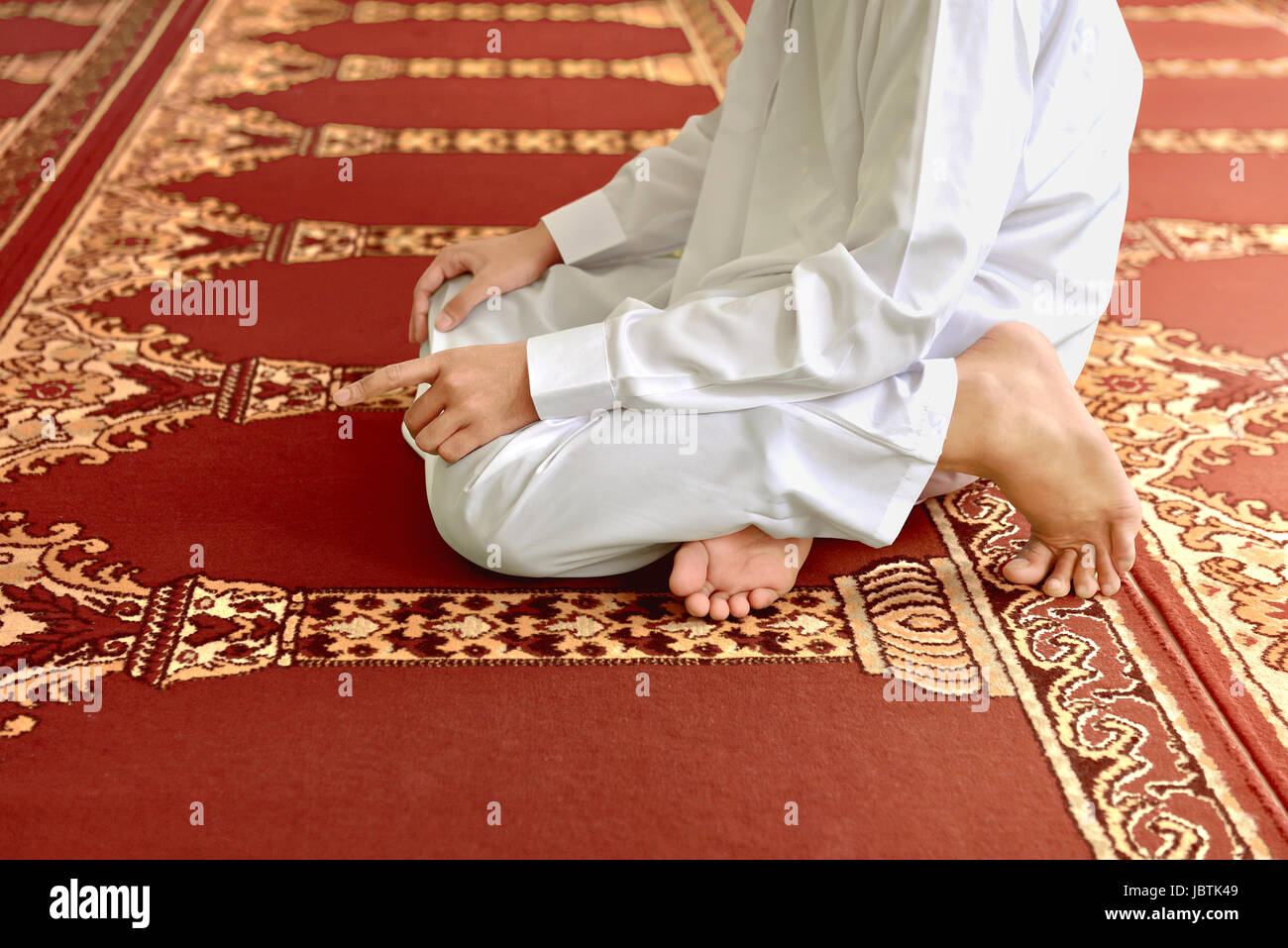 Muslim Praying On Knees