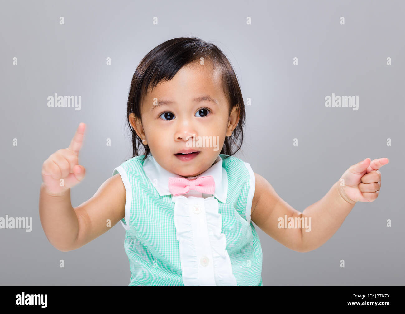 Little girl finger point Stock Photo - Alamy