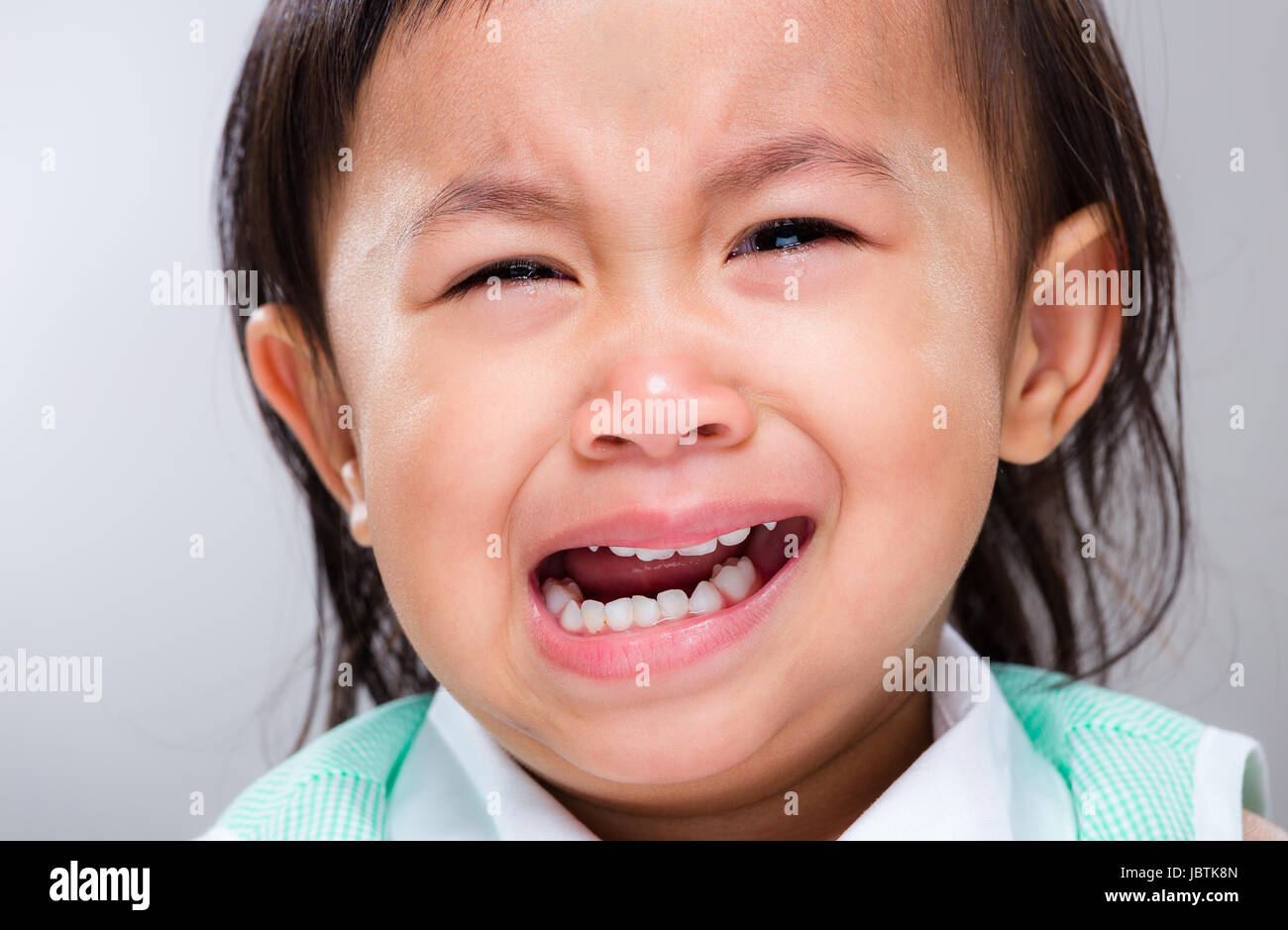 Little girl cry close up Stock Photo - Alamy