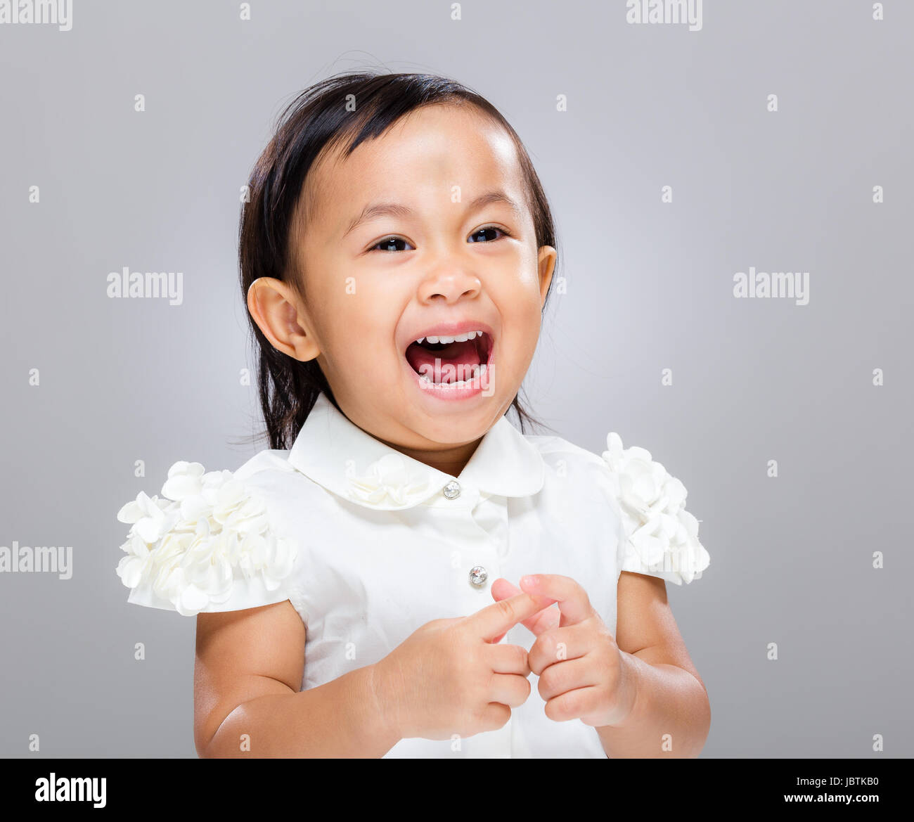Baby girl scream Stock Photo - Alamy