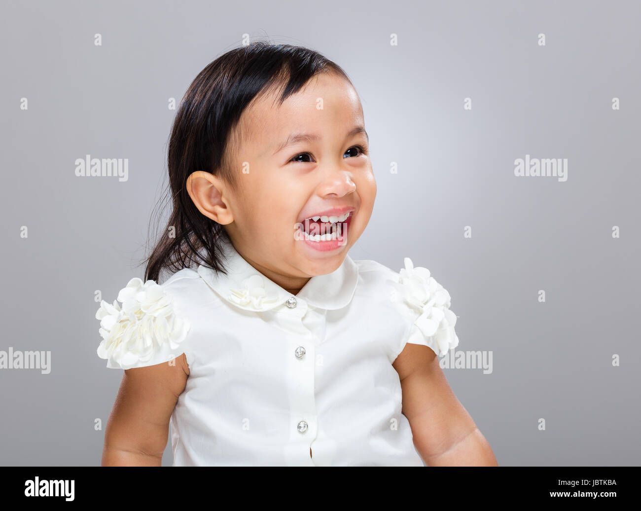 Excited baby girl Stock Photo - Alamy