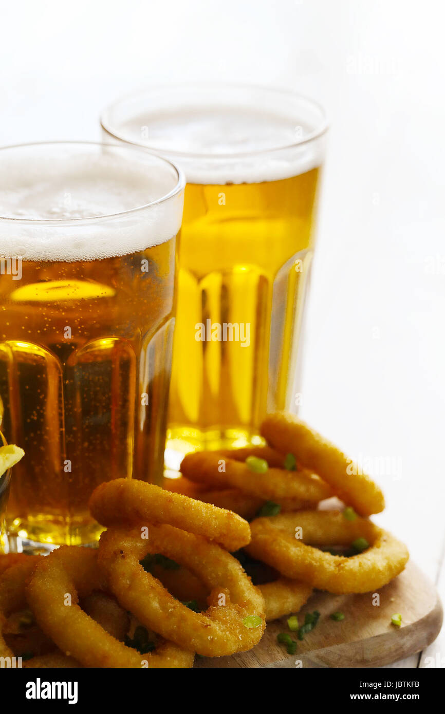 Alcohol and food. Beer with snacks on the table Stock Photo - Alamy