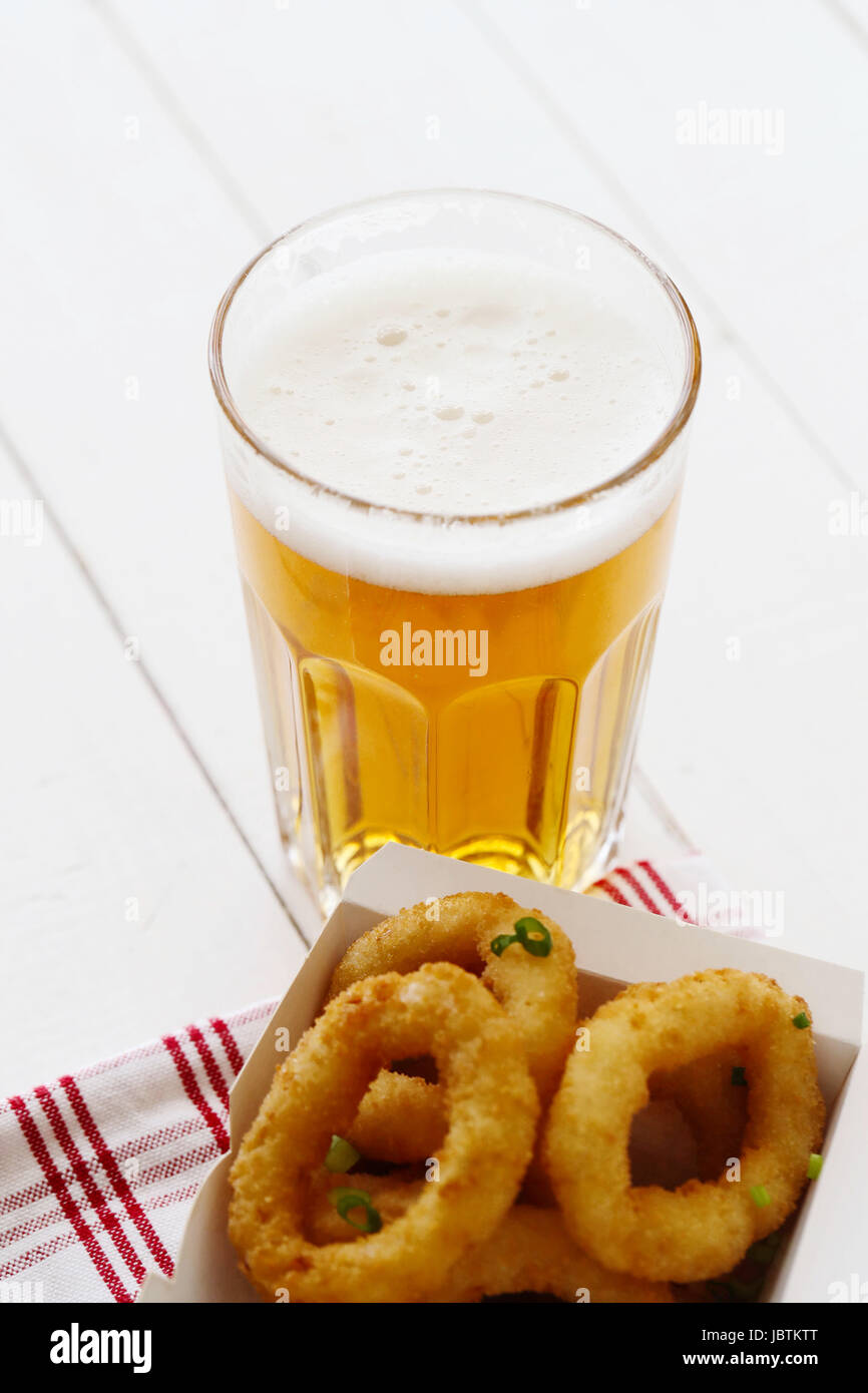 Alcohol and food. Beer with snacks on the table Stock Photo - Alamy