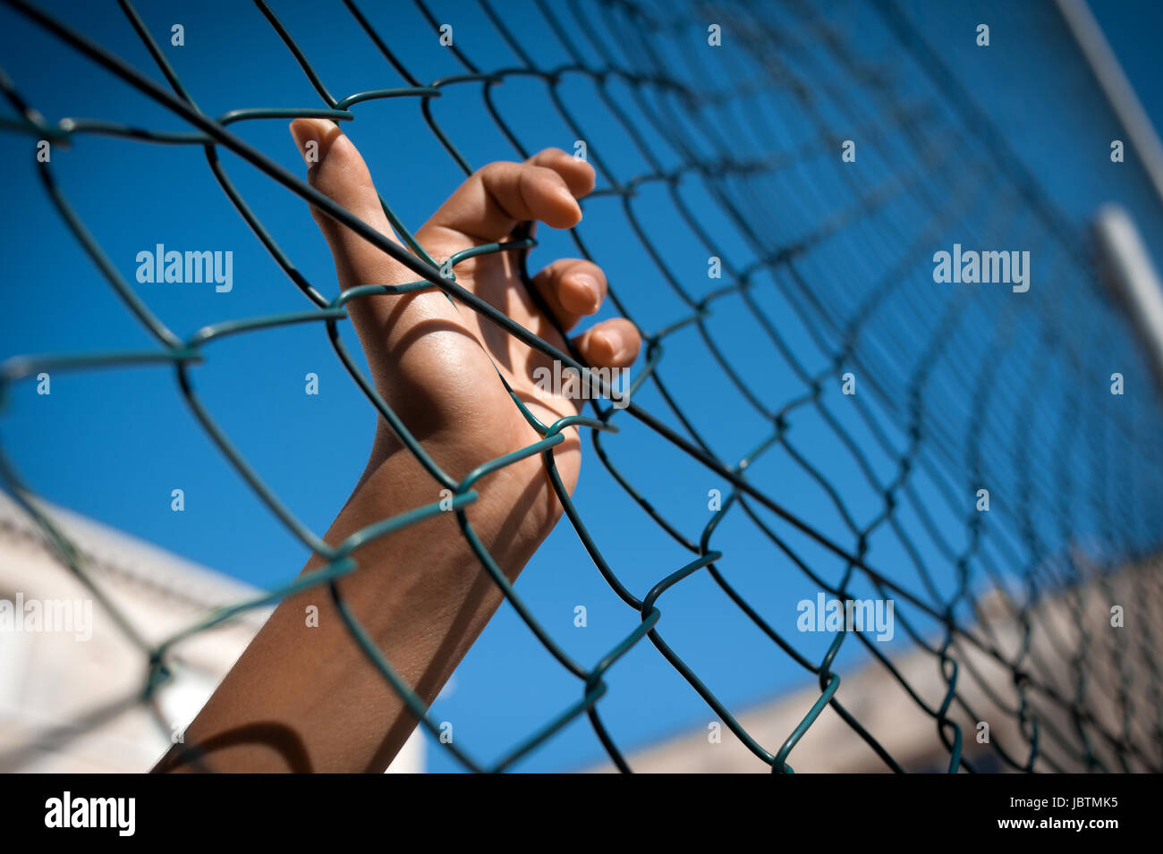 Clinging to her hand hi-res stock photography and images - Alamy