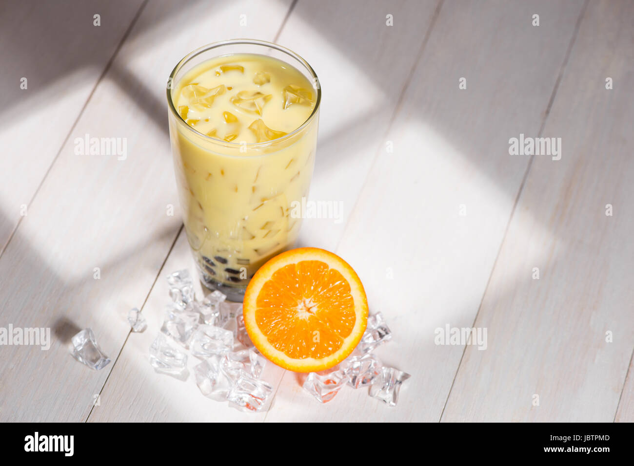 Boba / Bubble tea. Homemade Milk Tea with Pearls on wooden table Stock ...