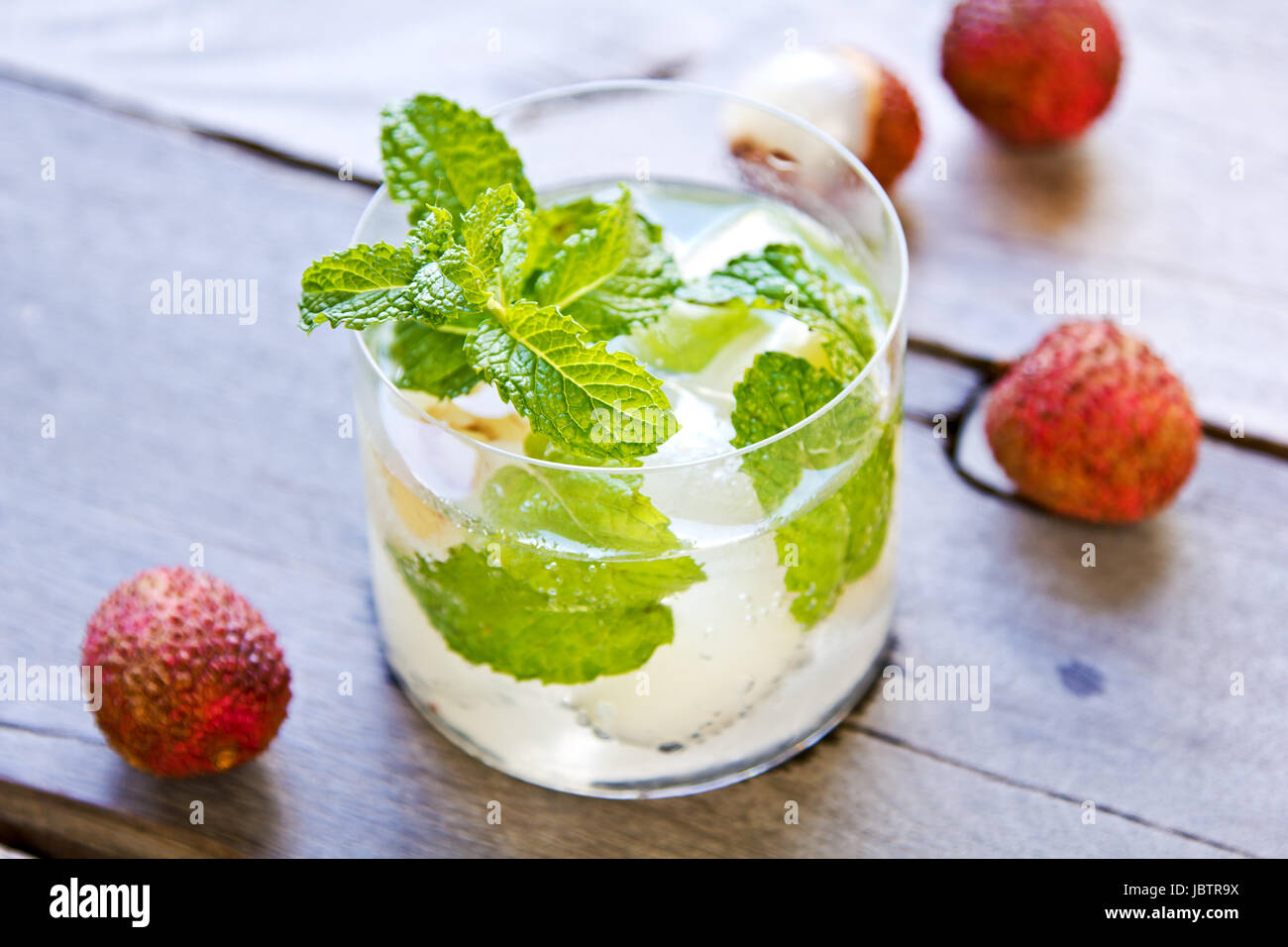 Lychee fizzy drink with mint Stock Photo - Alamy