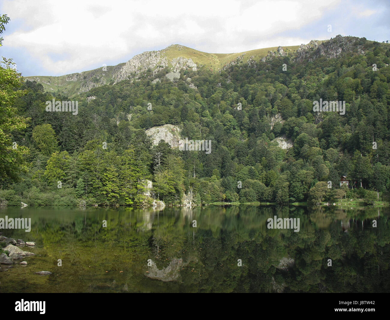 Looking-glass lake in the Vosges in France Stock Photo - Alamy