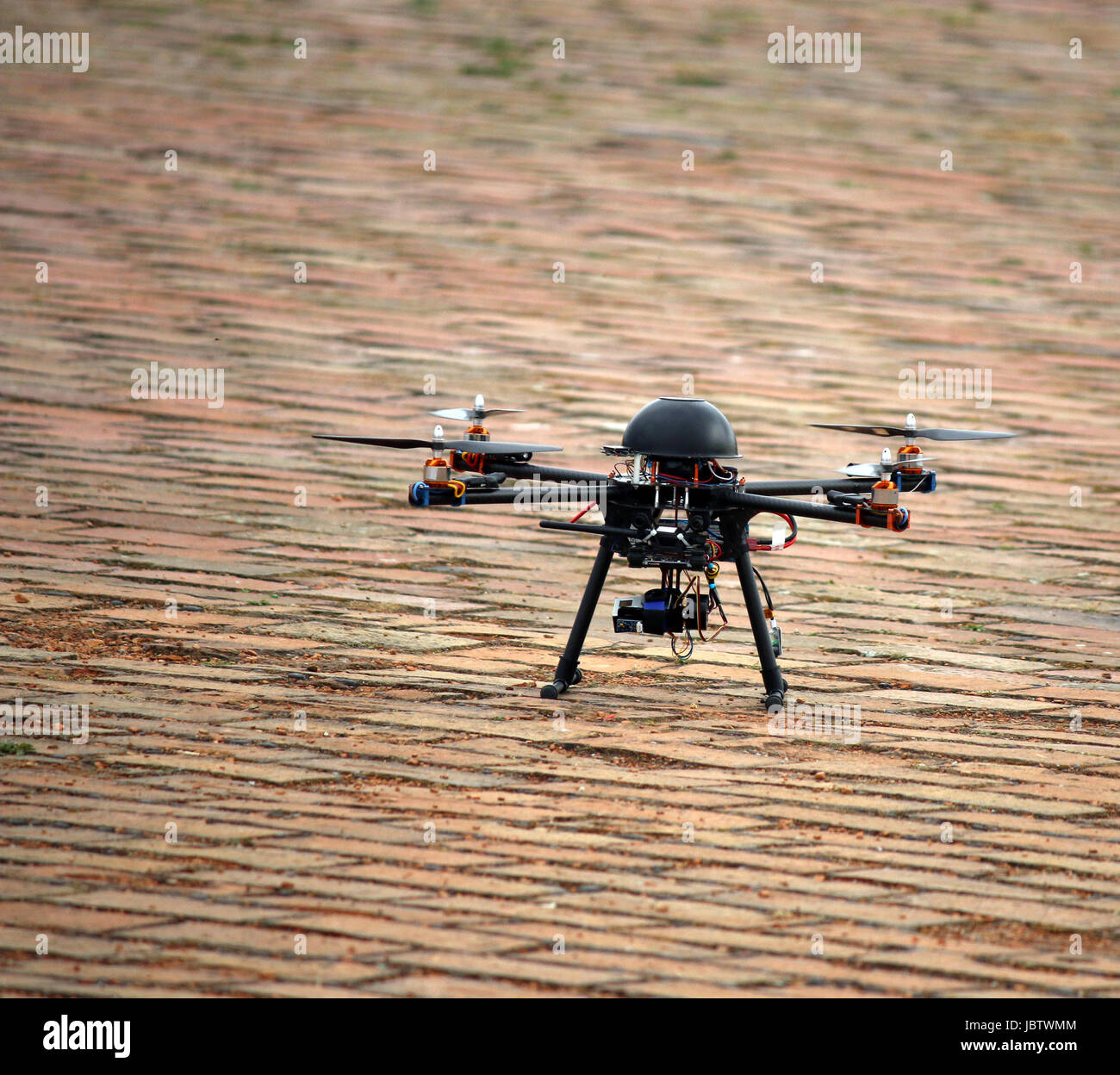 flying drone with camera on ground Stock Photo - Alamy